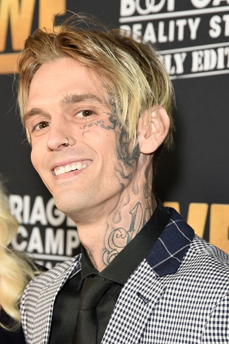 Fans React to Aaron Carter Getting His Face Tattoo Touched up and They ...