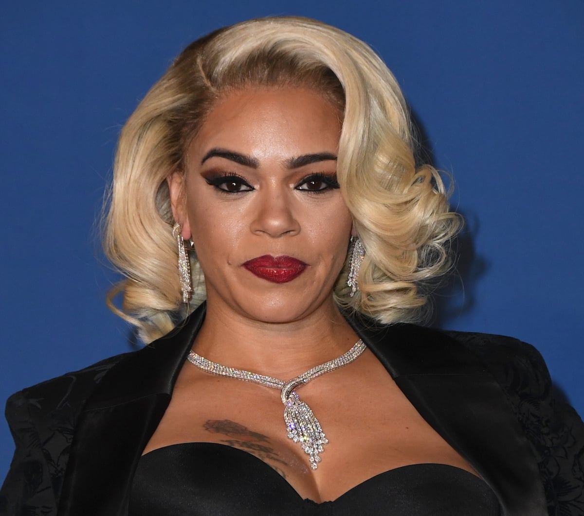 Faith Evans Speaks on Infamous Tupac Photo: 'It Was a Chance Meeting'