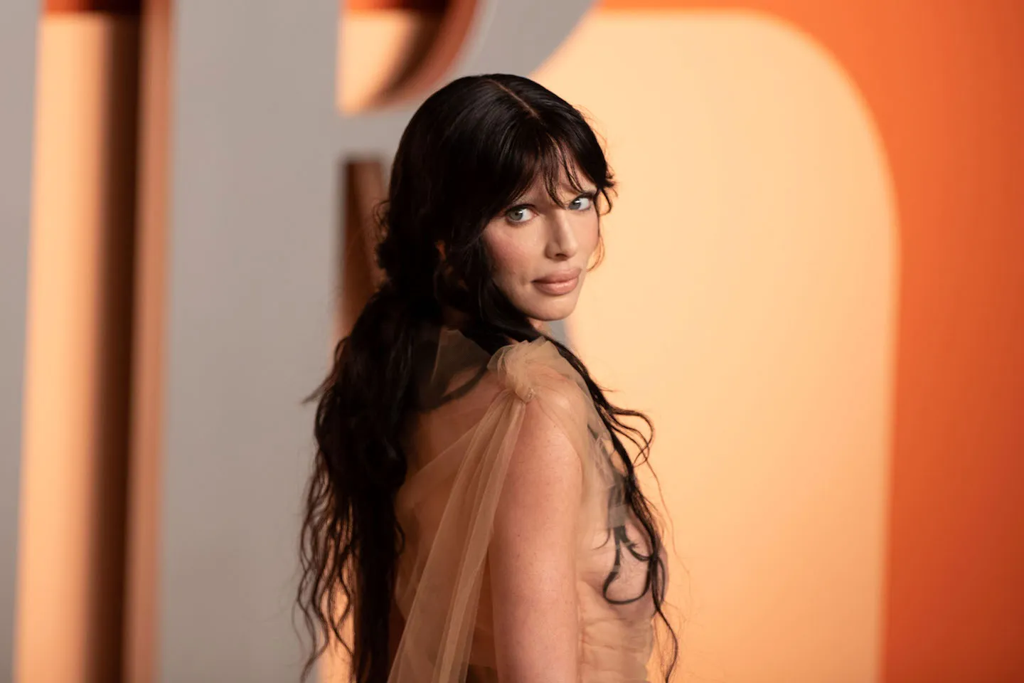 Julia Fox's Sheer Vanity Fair Dress Sparks Comparison to Bianca Censori's Grammy Look